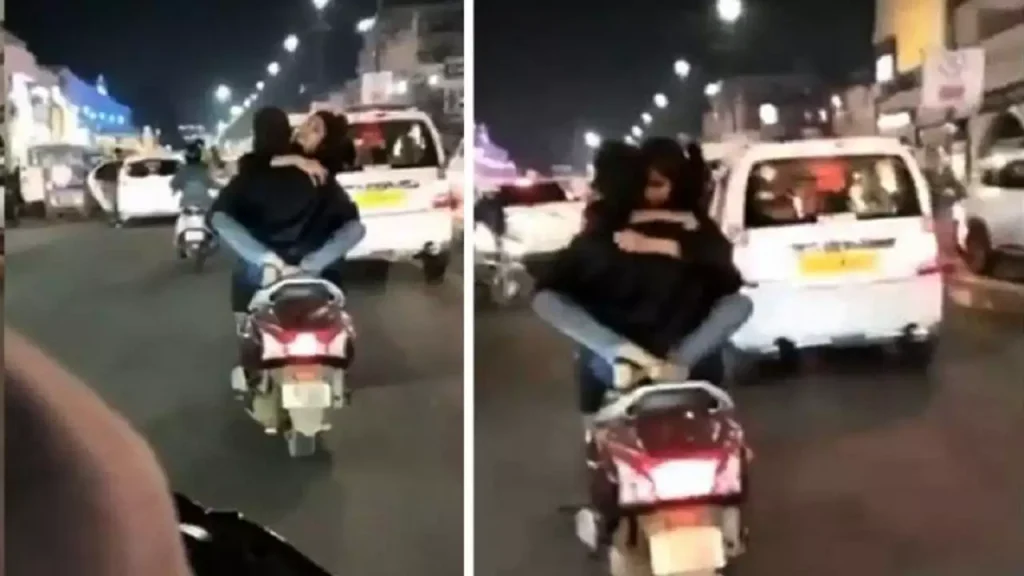 Couple getting viral ,seen romancing while riding a scooty in Lucknow